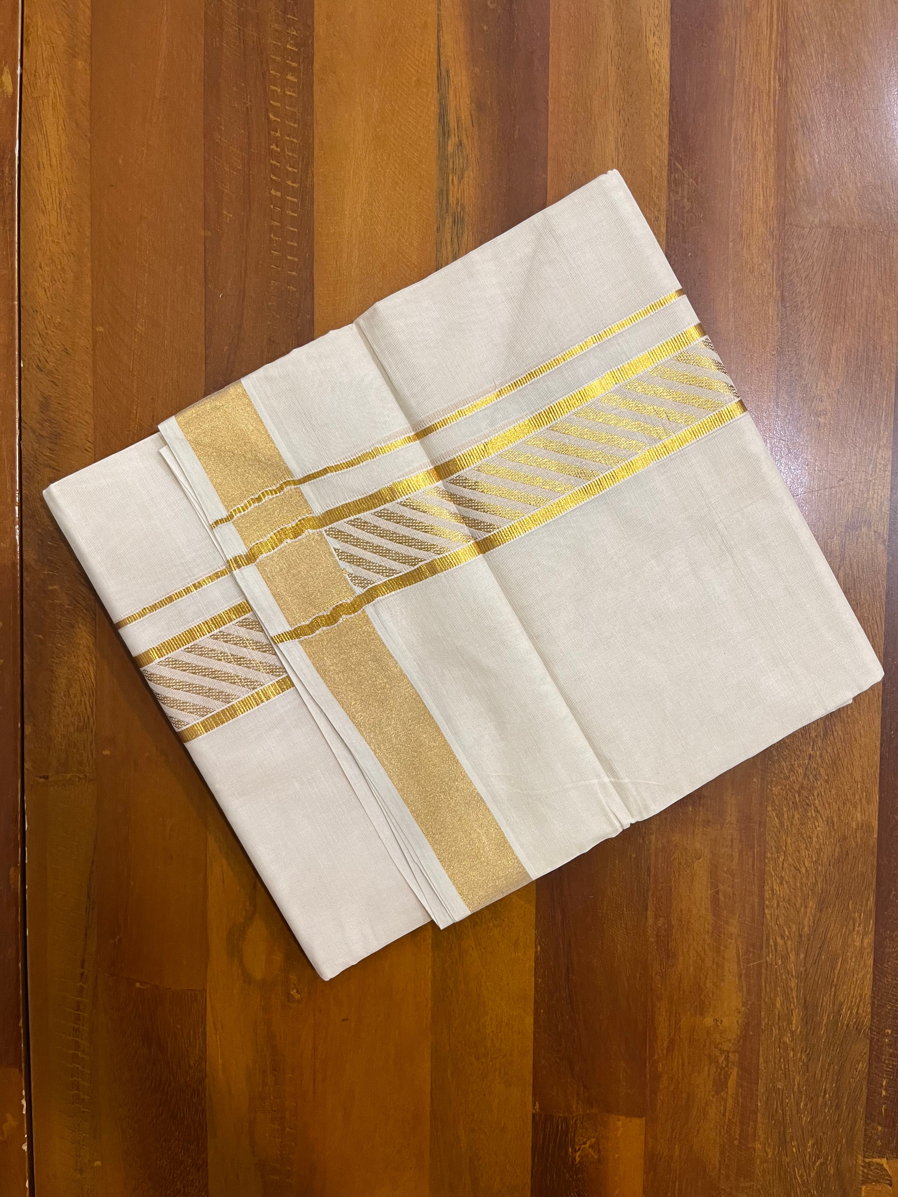 Southloom Kasavu Double Mundu with Woven Work Along the Kara ...